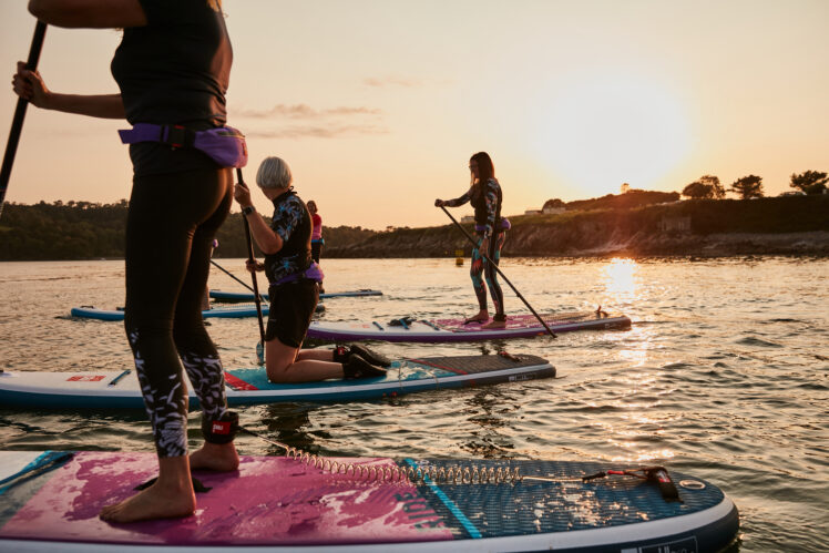7 Tips for Paddleboarding Beginners - The Frisky